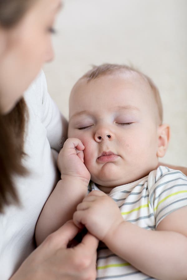 Mother Lulling Her Baby at Home Stock Image - Image of beingmom ...