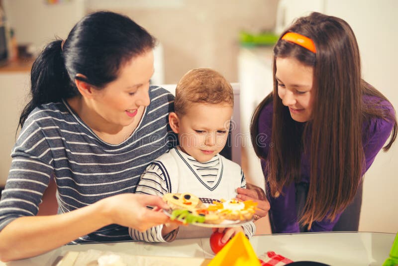 Mother Making Breakfast for Her Children Stock Image - Image of ...