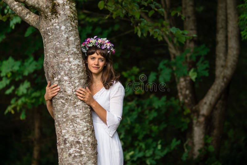 Mother Nature Hugging Tree stock photo. Image of woman - 27001760