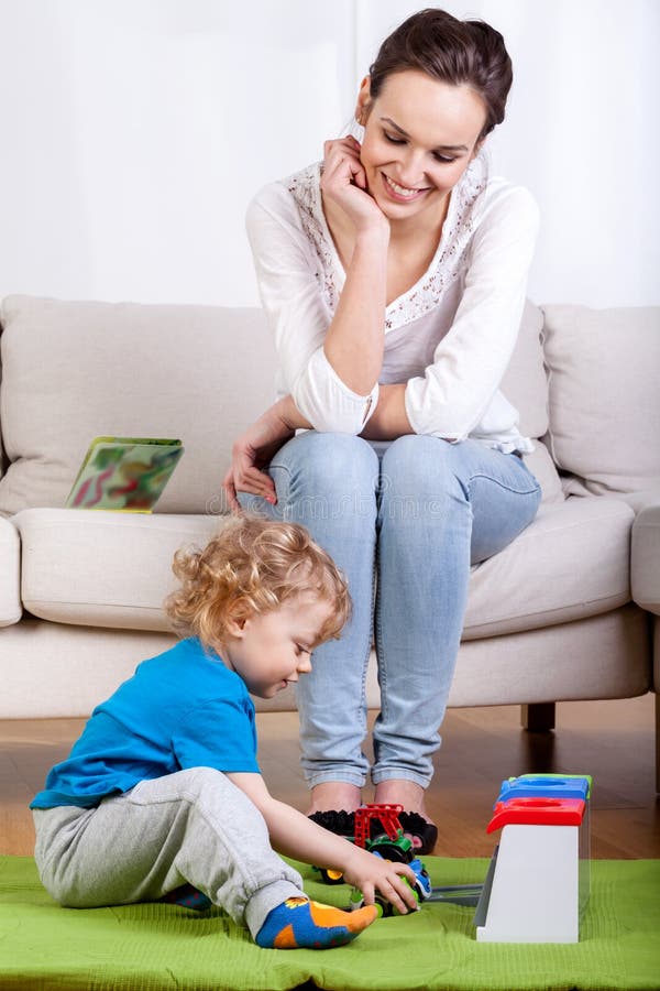 Mother and playing child stock image. Image of playroom - 41260193