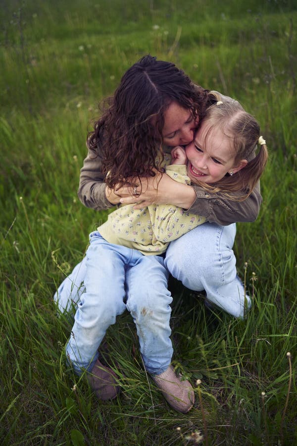Mother Plays Catch Up with Her Daughters Stock Image - Image of smile ...