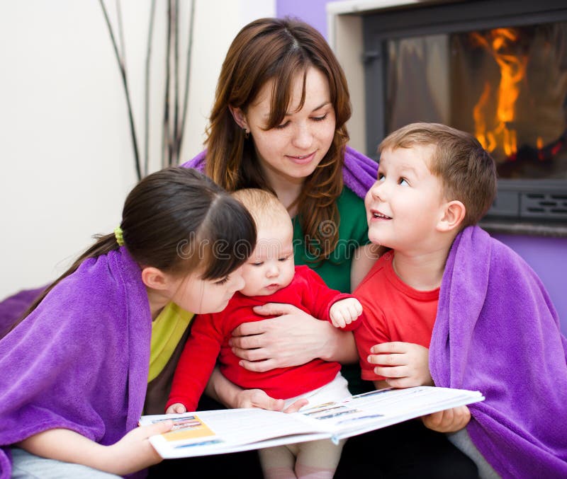 Mother is Reading Book with Children Stock Photo - Image of family ...
