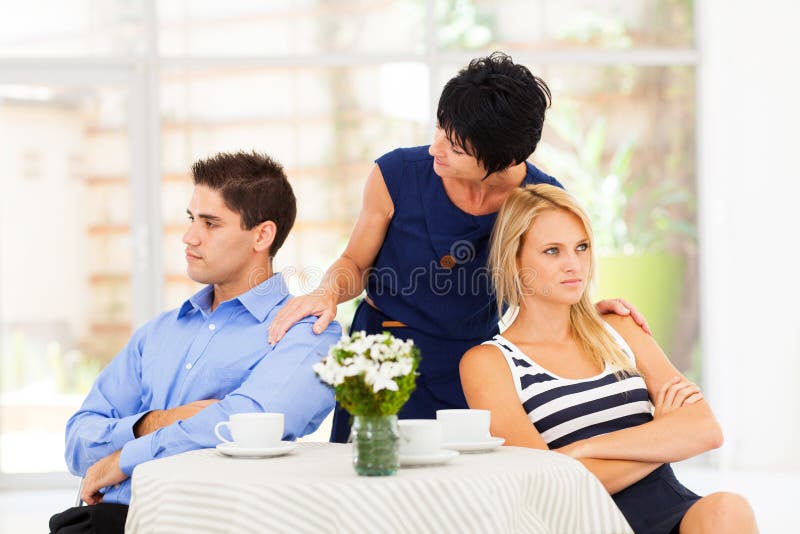 Mother reconciling couple stock image. Image of caring - 28702559