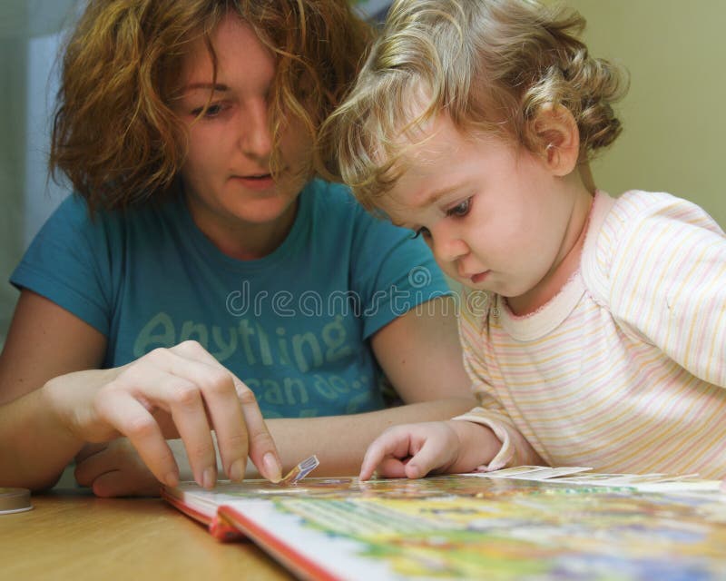 Mother s lesson stock image. Image of love, care, book - 4216013