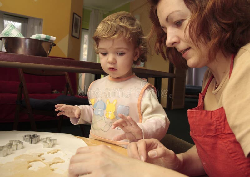 Mother s little helper stock photo. Image of blond, daughter - 4669808