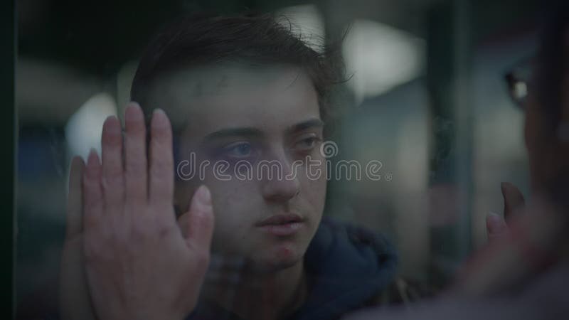 Mother Saying Goodbye To Son Waving Hands and Leaving Unhappy Stock ... Mother Saying Goodbye To Son Waving Hands and Leaving Unhappy Stock ...