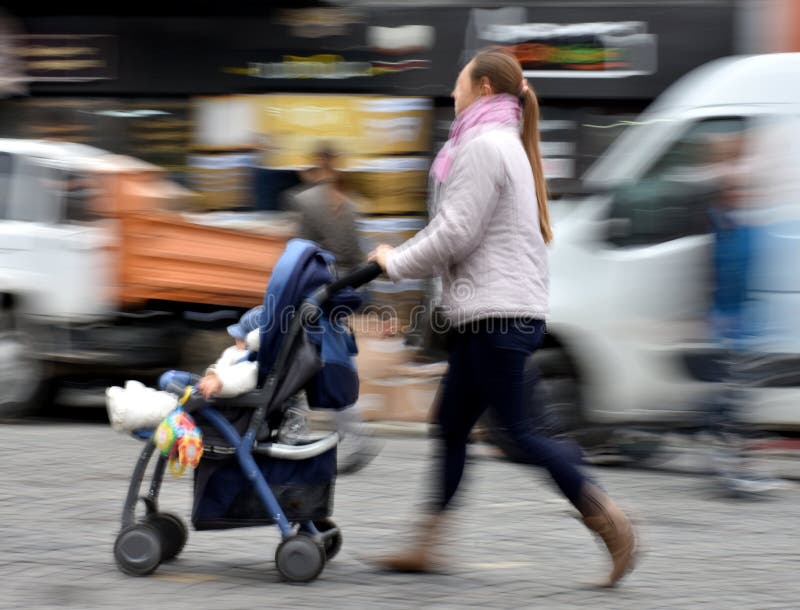 Mother with Small Child in the Stroller Editorial Image - Image of ...