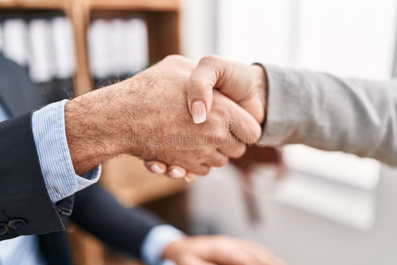 Mother and Son Business Workers Shake Hands at Office Stock Photo ...