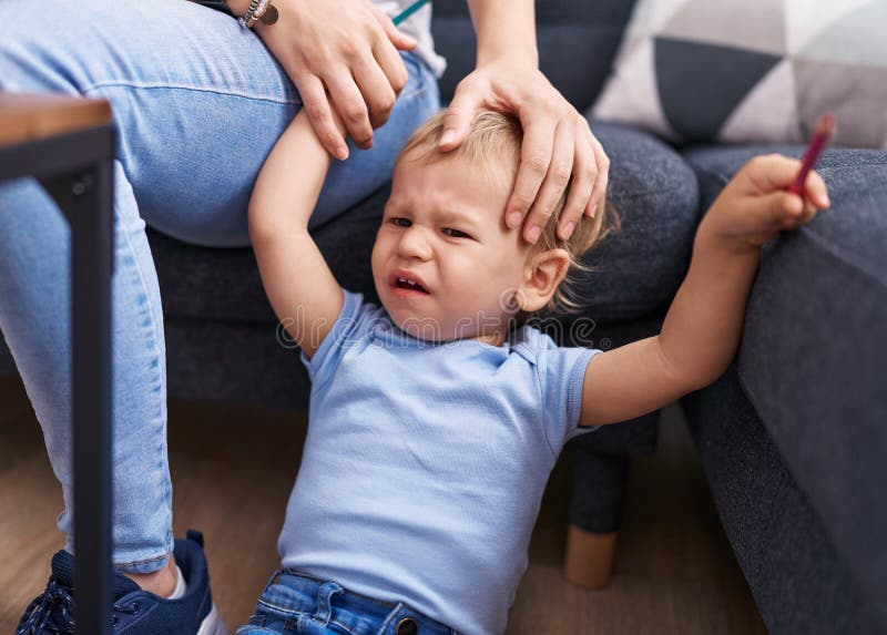 Mother and Son Crying on Floor at Home Stock Photo - Image of sitting ...
