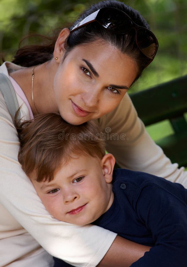 Mother and Son Cuddling Outdoor Stock Image - Image of color, caucasian ...