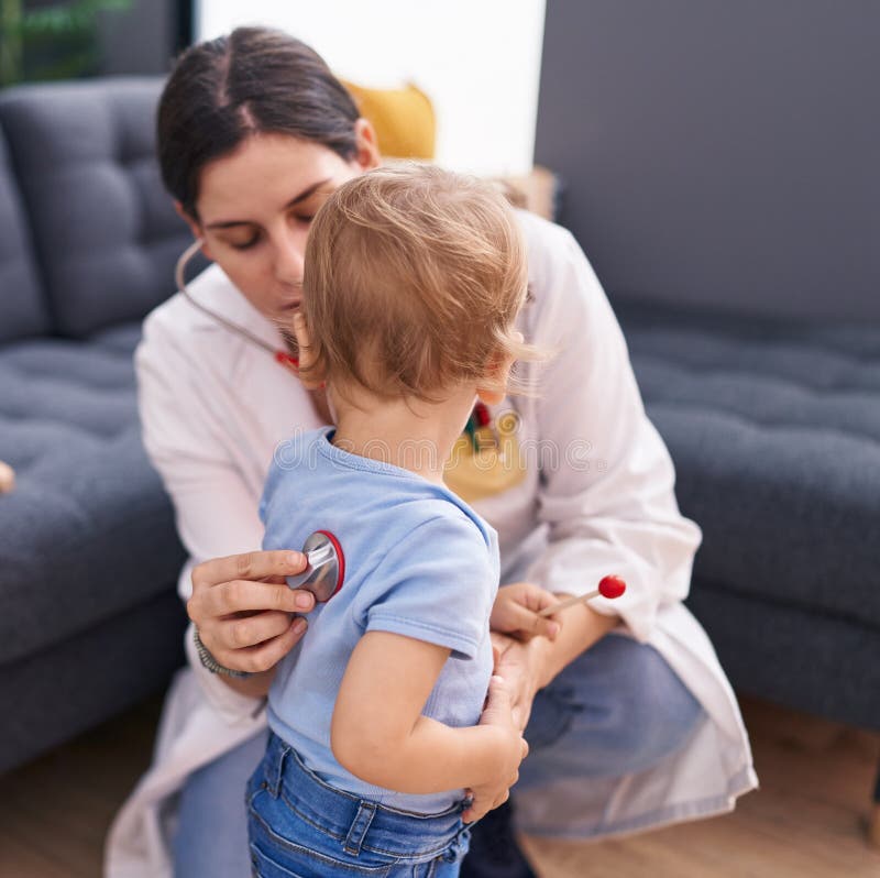 Mother and Son Doctor Examining Child at Home Stock Image - Image of ...