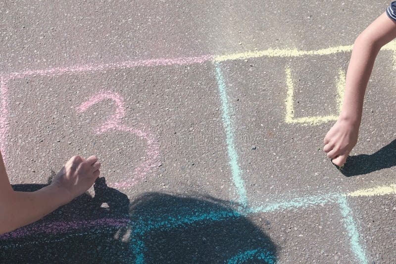 Mother and Son Draw Numbers Two and Three on the Hopscotch on Asphalt ...