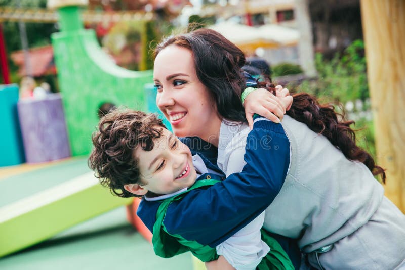 Mother and Son Having Fun in Amusement Park Stock Photo - Image of ...