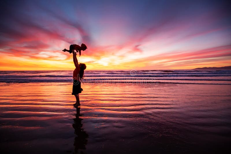 Mother and Son Having Fun at Sunset on the Beach Stock Image - Image of ...
