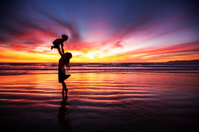 Mother and Son Having Fun at Sunset on the Beach Stock Image - Image of ...