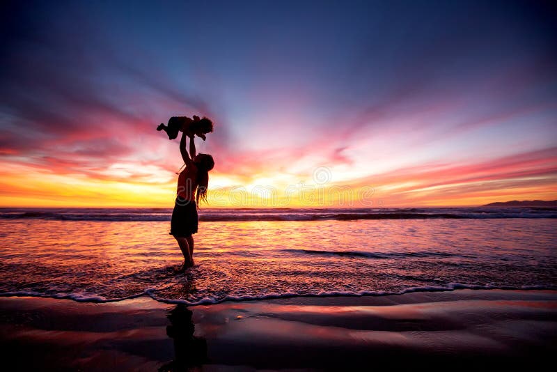 Mother and Son Having Fun at Sunset on the Beach Stock Image - Image of ...
