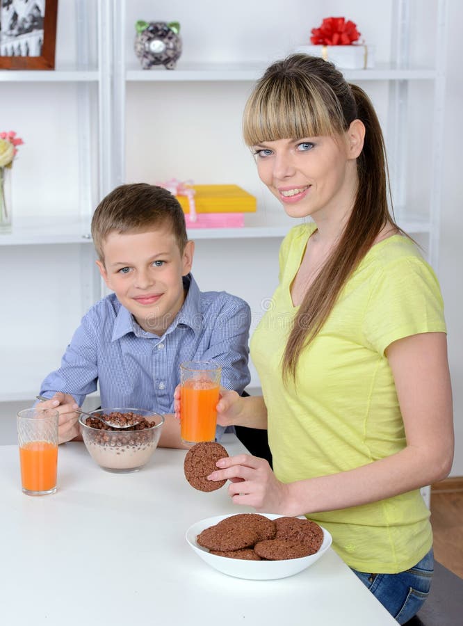 Mother and Son at Home stock image. Image of loudspeaker - 41359635