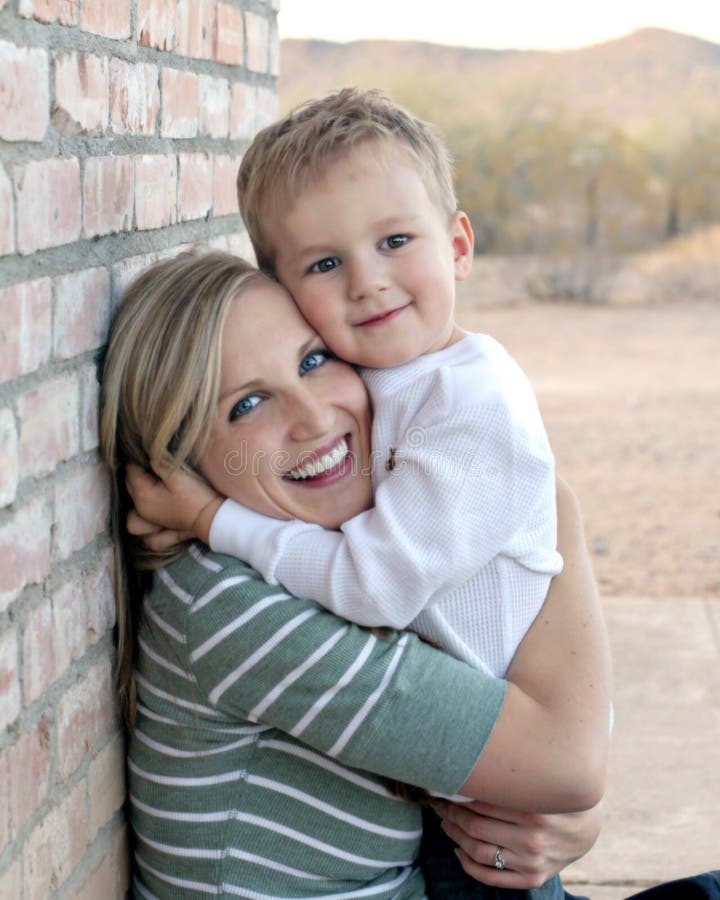 Mother and Son Hugging stock image. Image of outside - 19493165 Mother and Son Hugging stock image. Image of outside - 19493165