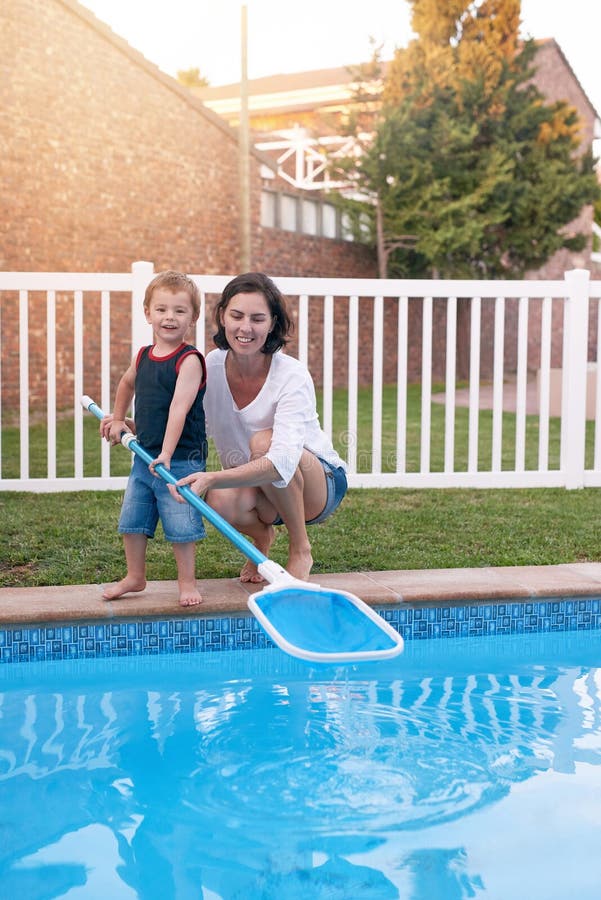 Mother, Son and Net for Cleaning Pool in Backyard, Chore and Teaching ...