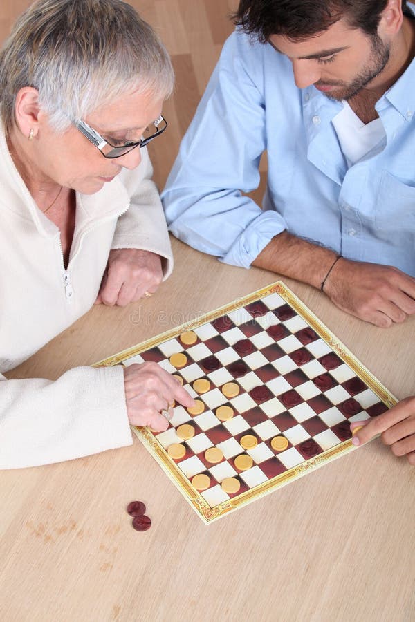 Mother and Son Playing Drafts Stock Image - Image of caucasian, hair ...