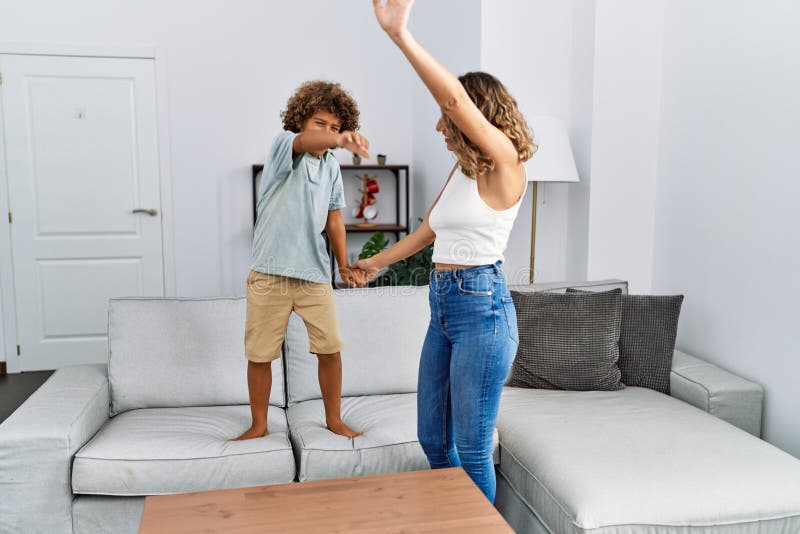 Mother and Son Smiling Confident Dancing at Home Stock Photo - Image of ...