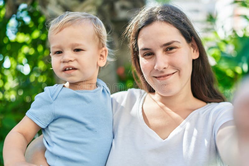 Mother and Son Smiling Confident Make Selfie by Camera at Park Stock ...