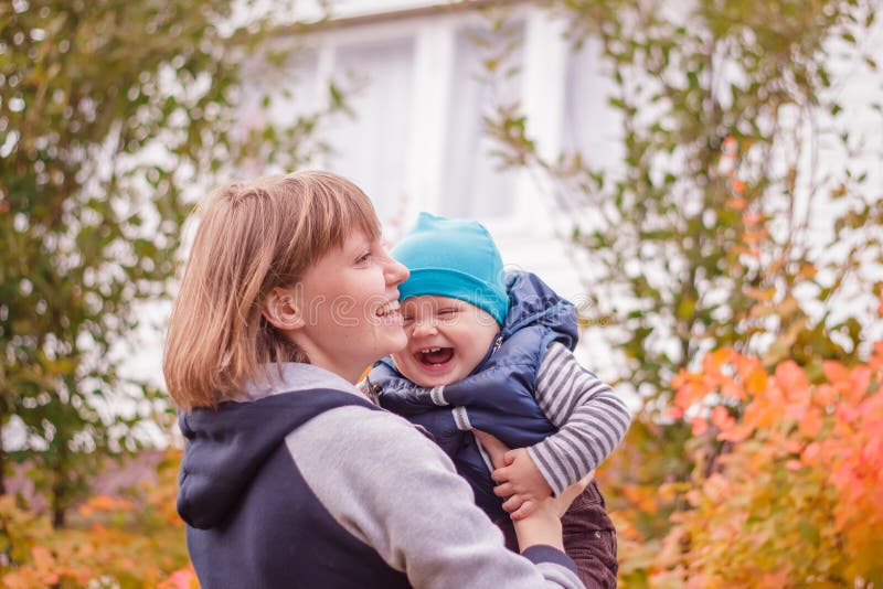 Mother and Son Smiling Outdoors Stock Photo - Image of family, child ...