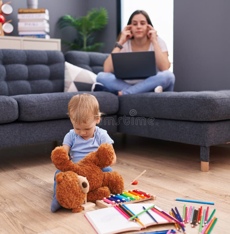 Mother and Son Stressed Using Laptop Playing at Home Stock Photo ...