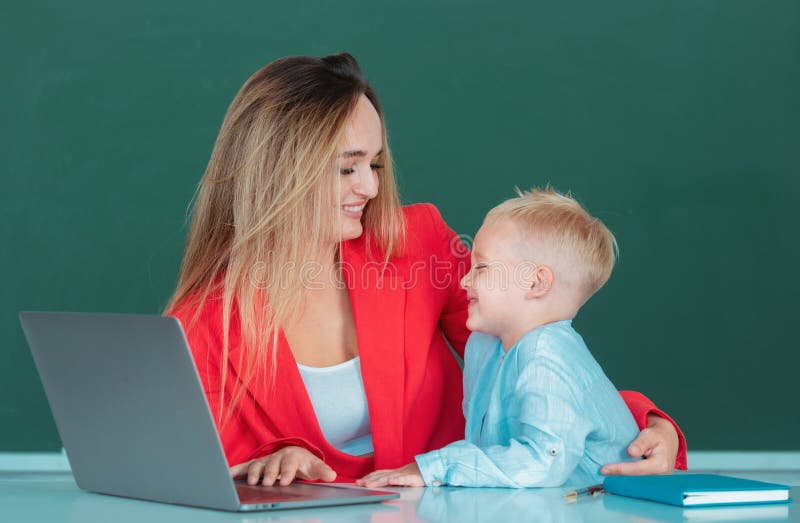 Little School Child Son Using Laptop with Mother. Elementary School ...