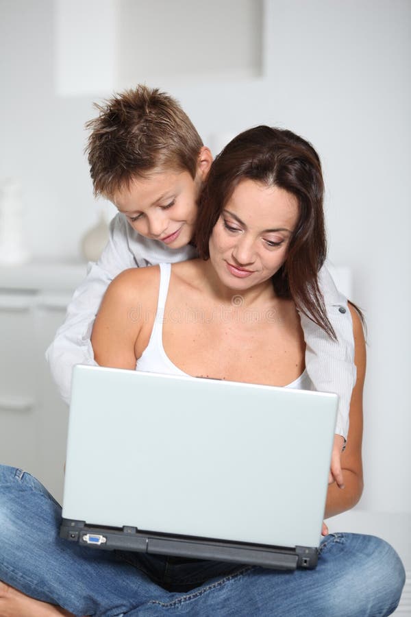 Mother and Son with Computer Stock Image - Image of technology, sofa: 16281613