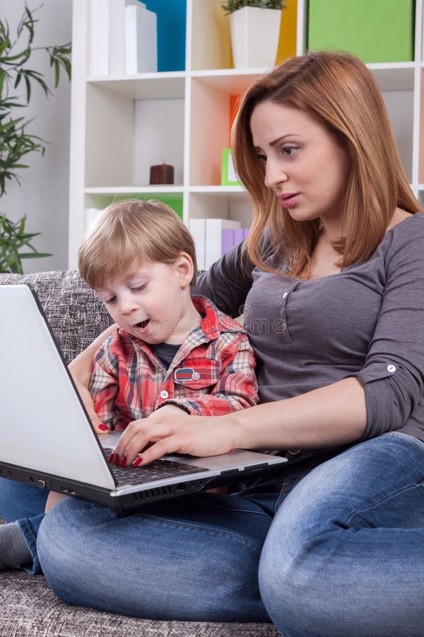 Mother and Son Using Computer Stock Photo - Image of happiness, happy ... Mother and Son Using Computer Stock Photo - Image of happiness, happy ...