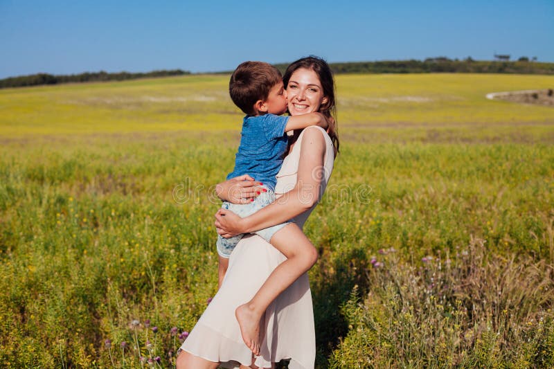 Mother and Son Walking in the Nature of a Rural Field Stock Image ...