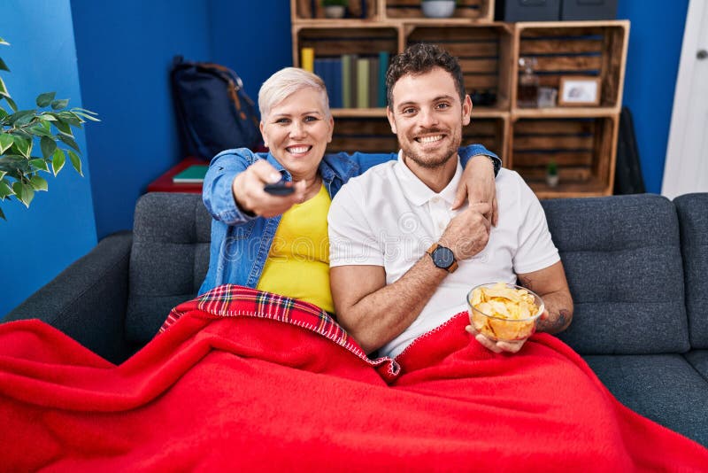 Mother and Son Watching Movie Sitting on Sofa at Home Stock Photo ...