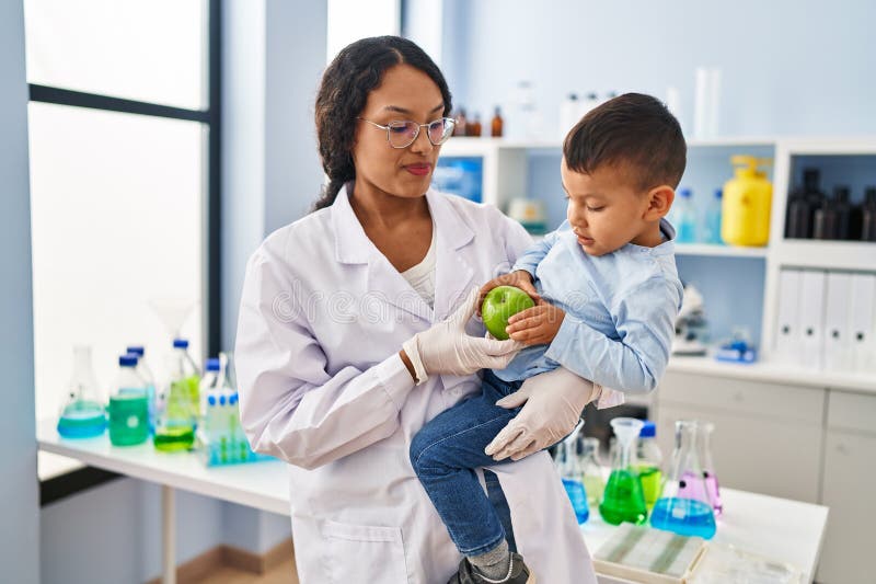 Mother and Son Wearing Scientist Uniform Hugging Each Other at ...