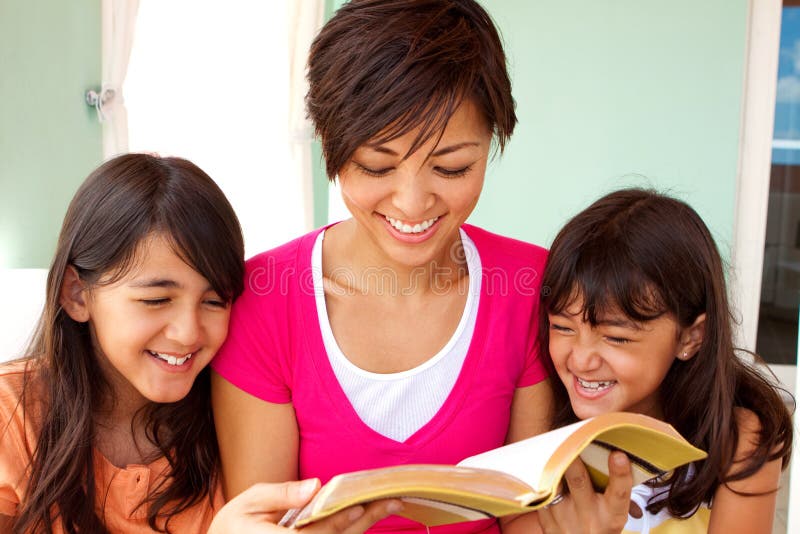 Mother Spending Time Reading with Her Daughters. Stock Image - Image of ...