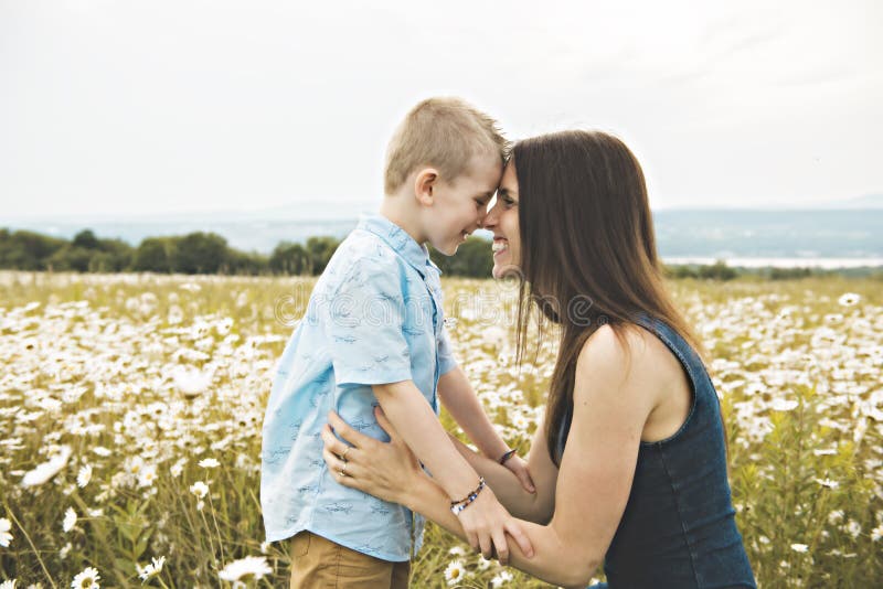 Mother Spending Time with Son during the Sunset. Stock Photo - Image of ...