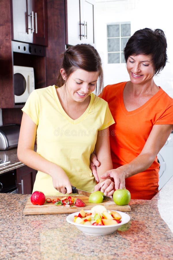 Mother Teaching Daughter Cooking Stock Photo - Image of cutting ...