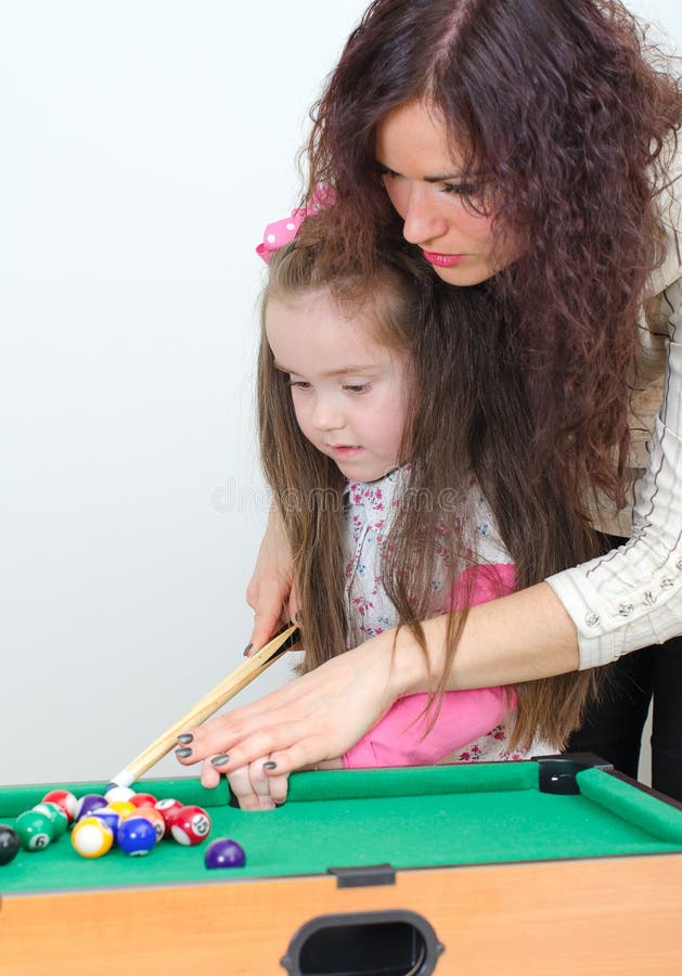 Mother Teaching Daughter Play Billiard Stock Image - Image of mother ...