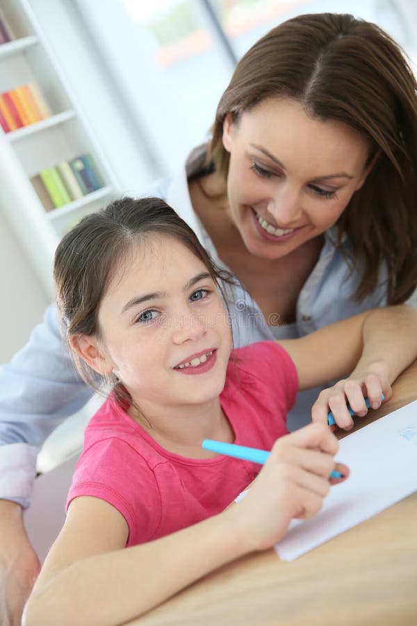 Mother Teaching Her Daughter To Write Stock Image - Image of mommy ...