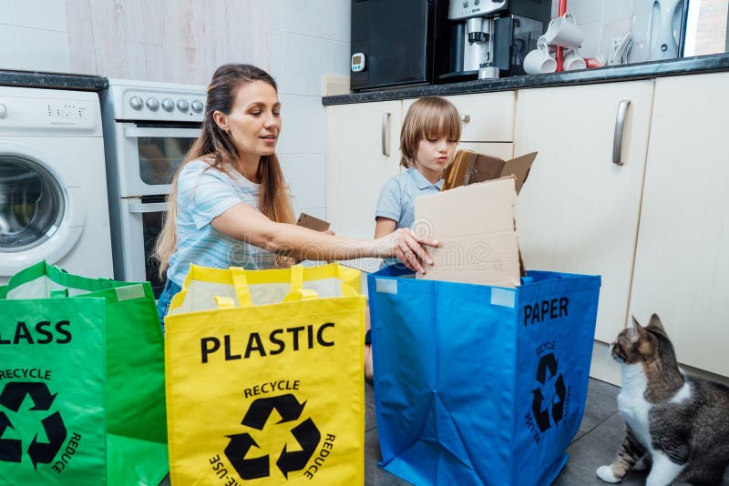 Mother is Teaching Kid How To Recycle Help the Boy Aware Environmental ...