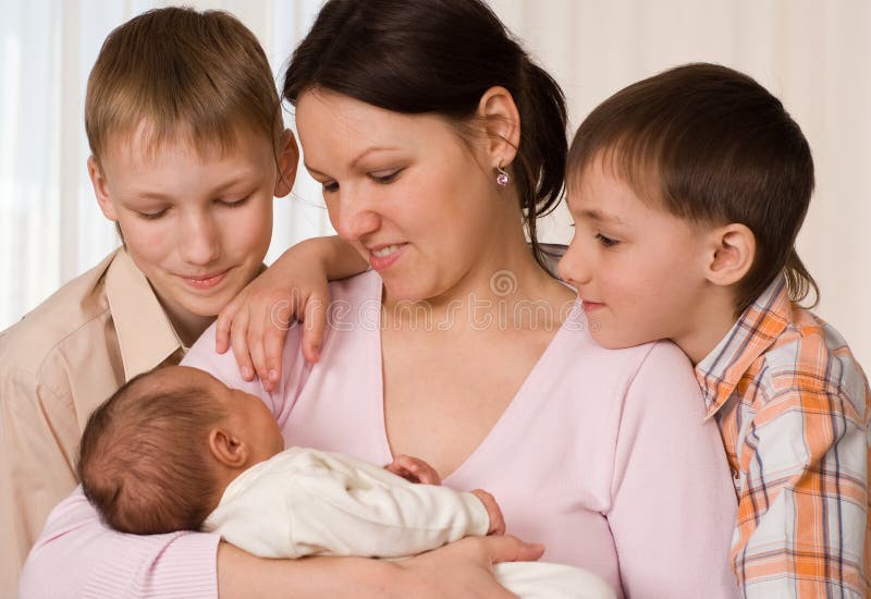 Mother with three children stock image. Image of brothers - 13968361