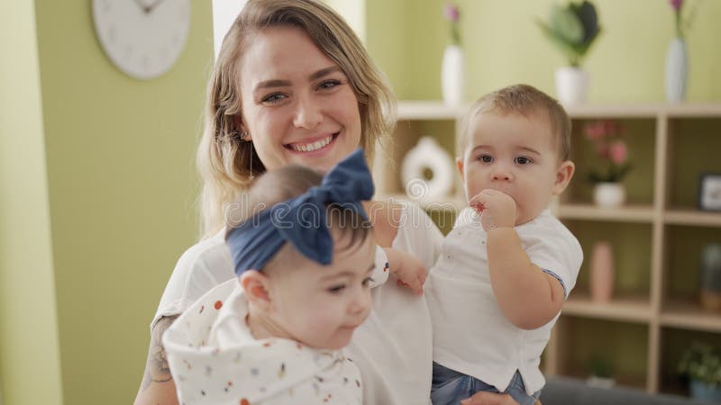 Mother and Toddlers Smiling Confident Standing at Home Stock Photo ...