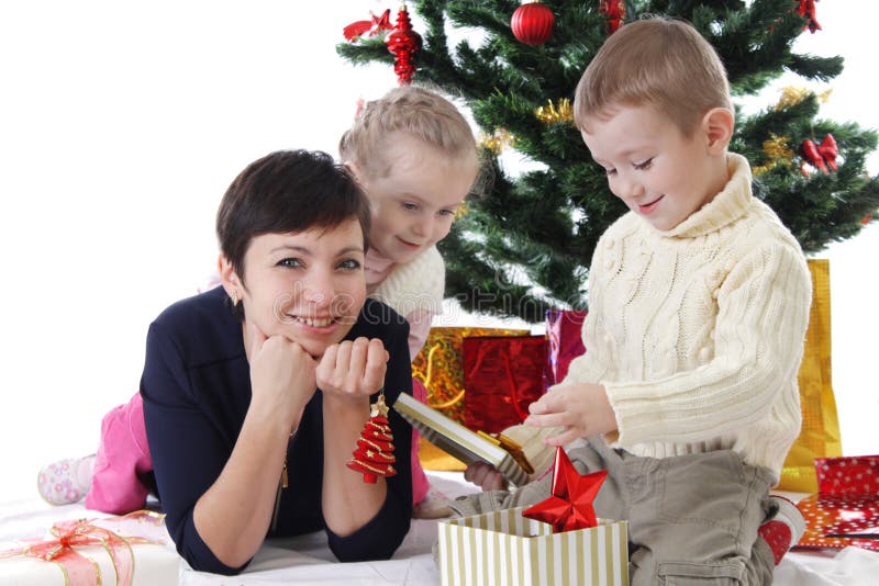 Mother and Two Children Openning Presents Stock Image - Image of ...