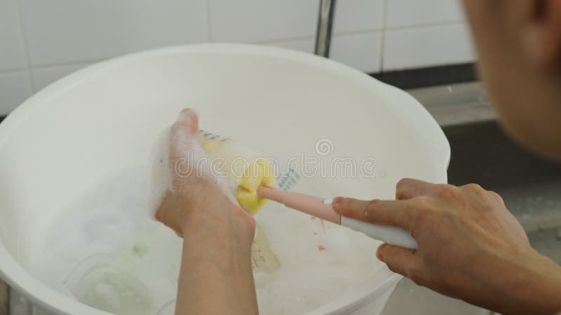 Mother Washing Baby Plastic Milk Bottle Stock Video - Video of care ...