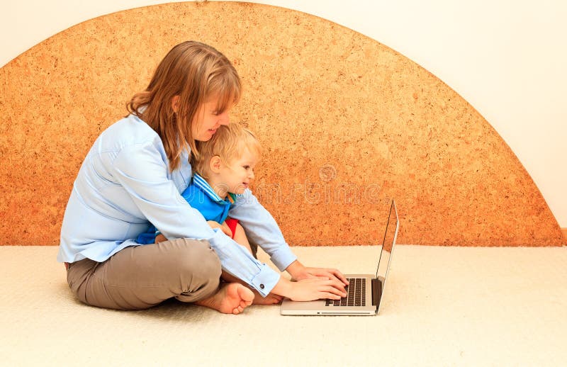 Mother working from home stock image. Image of leisure - 27109715