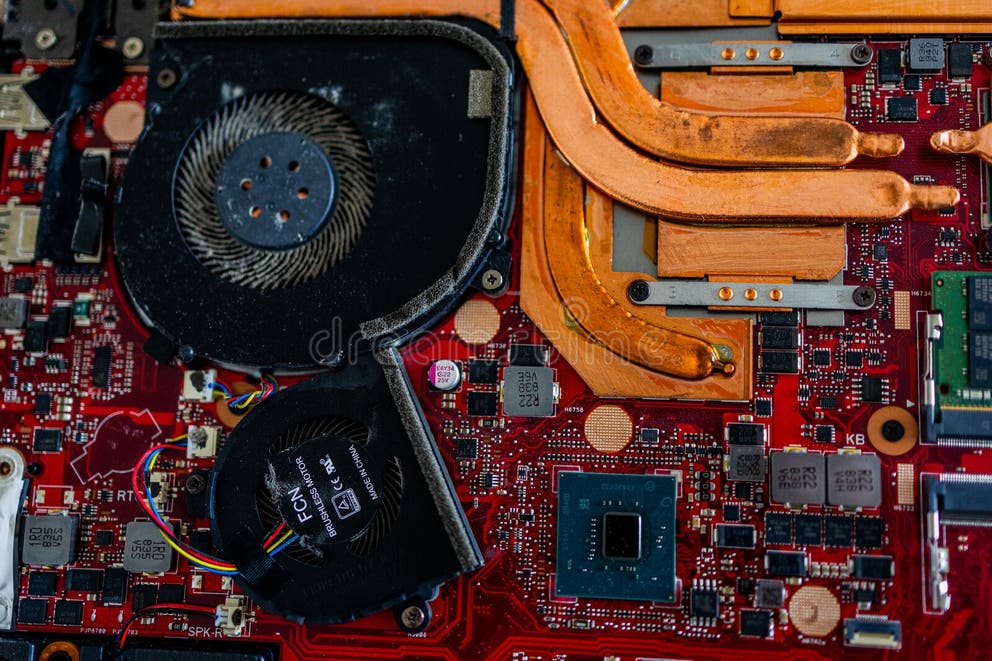 A Motherboard with Intricate Circuit Patterns, RAM Modules, and Various ...