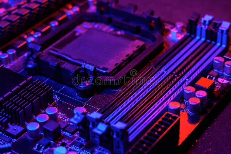 The Processor on the Motherboard in Neon Light. Computer Parts Stock ...