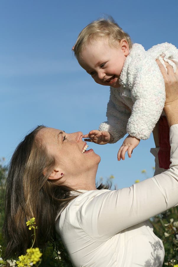 Motherly love stock image. Image of bonding, daughter, outdoors - 574143