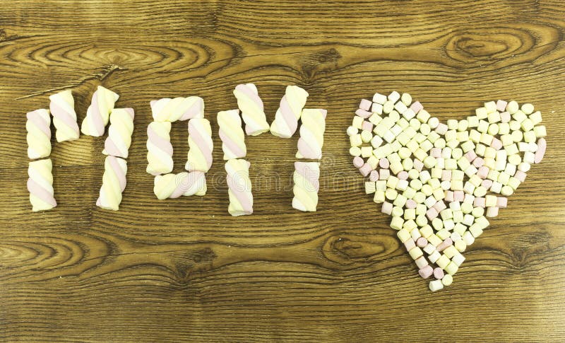 Mothers Day Concept.Written the Text: MOM on Wooden Background. Stock ...