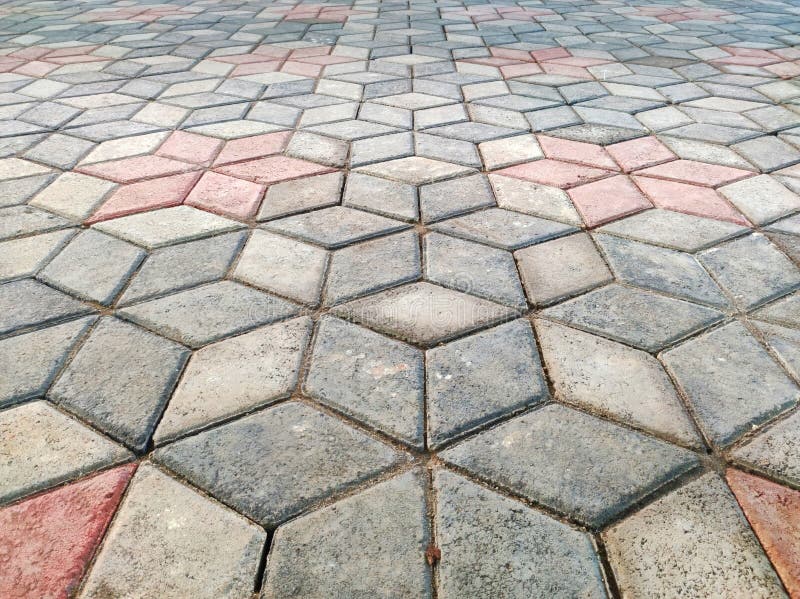 A motif on the paving road stock photo. Image of circle - 272490346